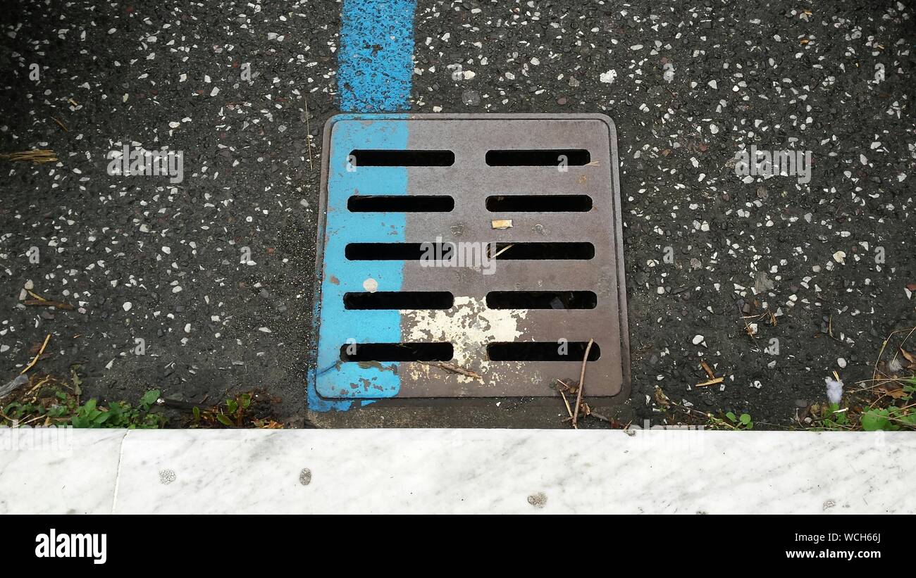 Manhole at road hi-res stock photography and images - Alamy