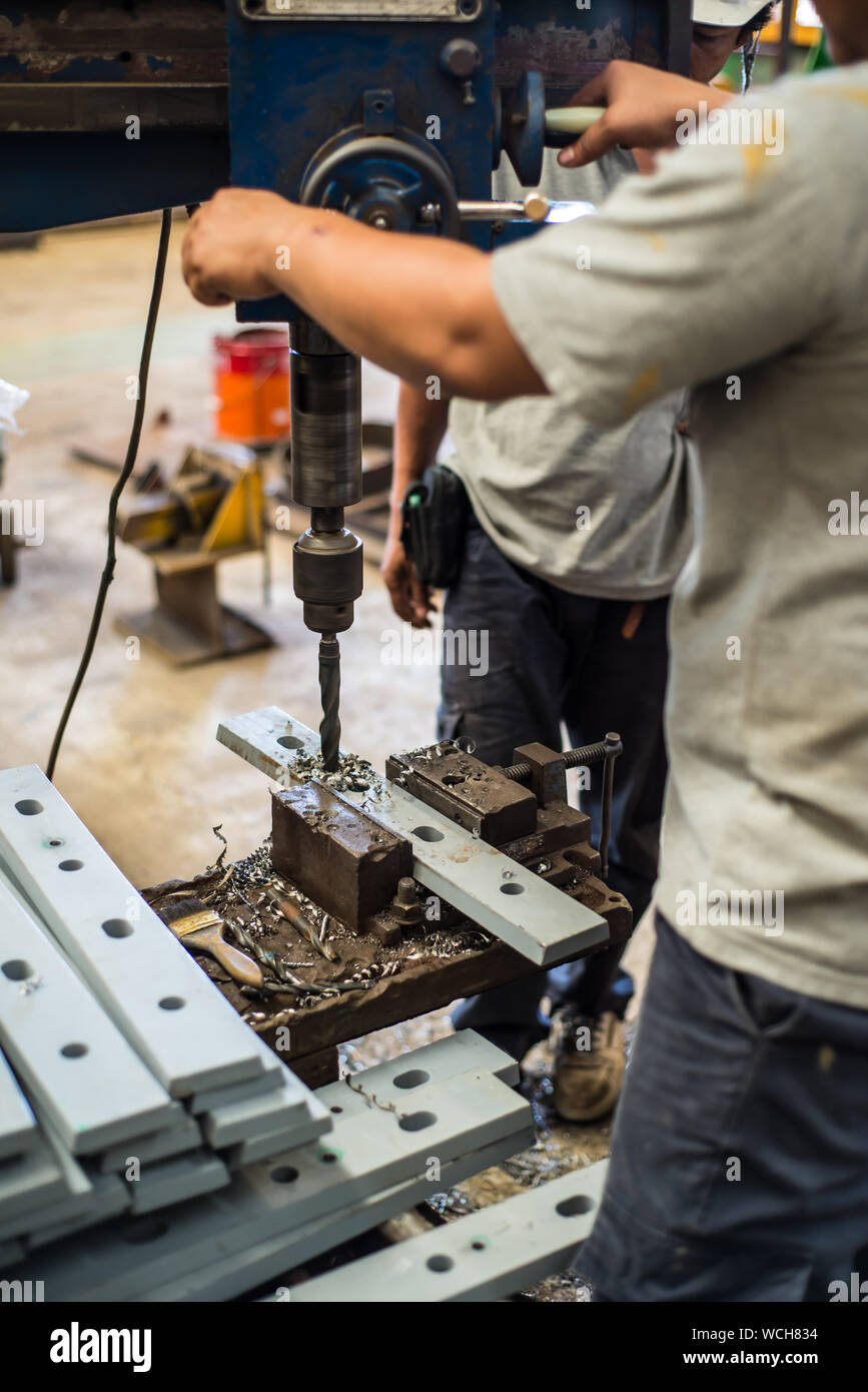 Men work factory hi-res stock photography and images - Alamy