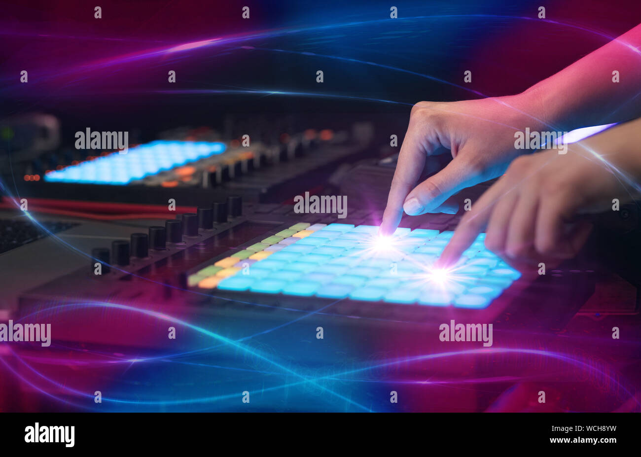 Hand mixing music on midi controller with wave vibe concept Stock Photo ...