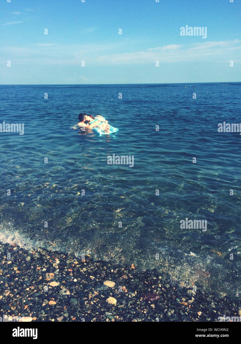 Couple kissing in water hi-res stock photography and images - Alamy