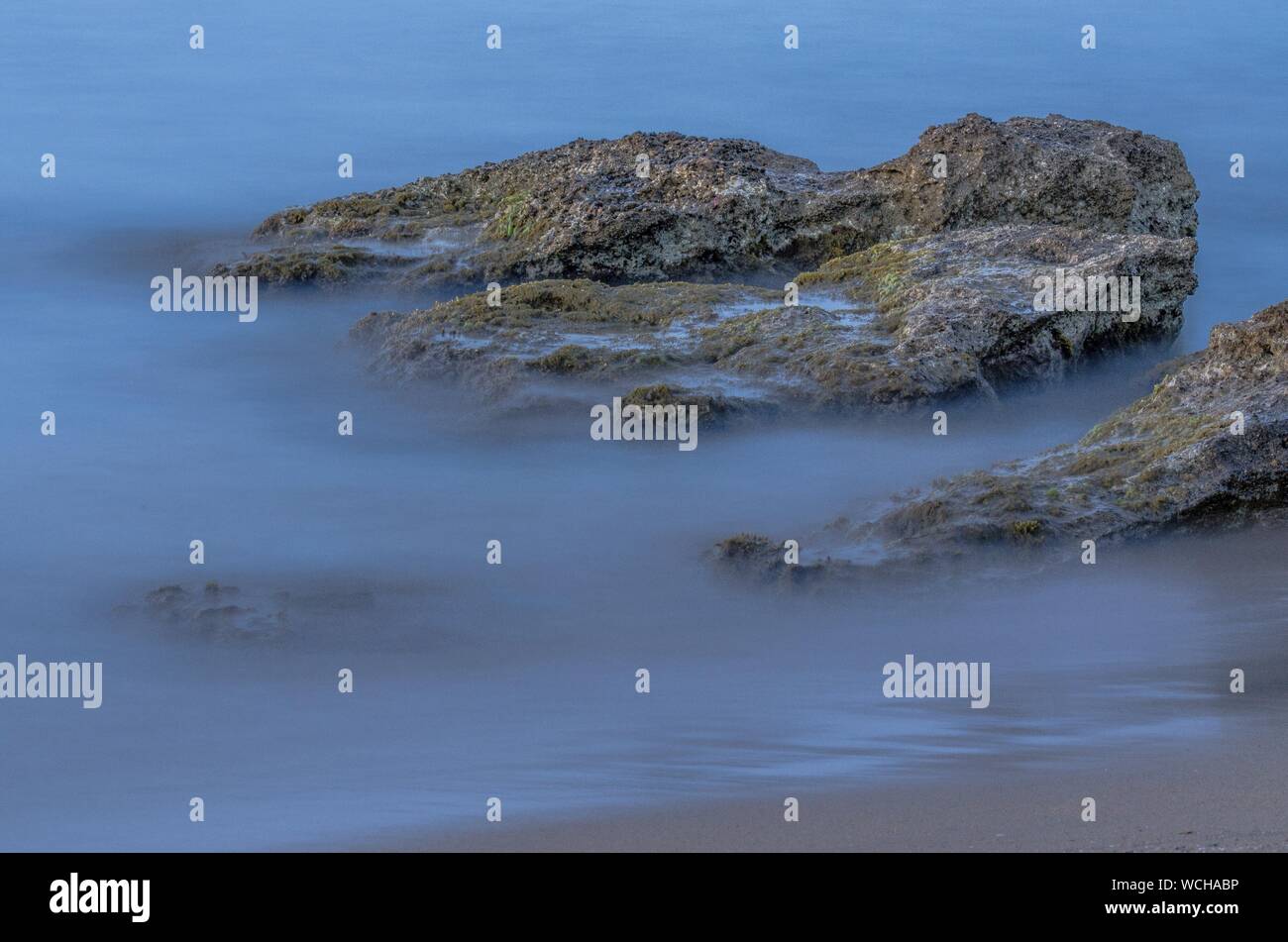 Rushing water through rocks hi-res stock photography and images - Alamy