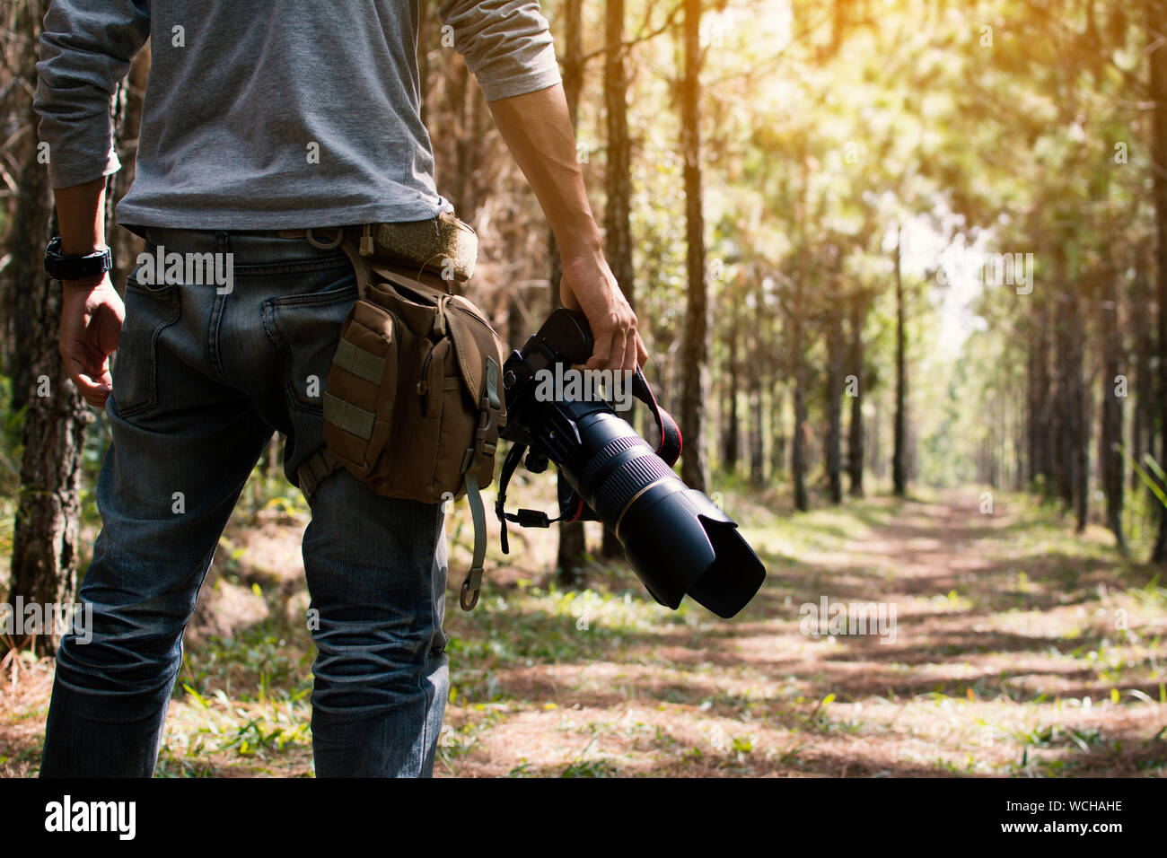 Man holding camera hi-res stock photography and images - Alamy