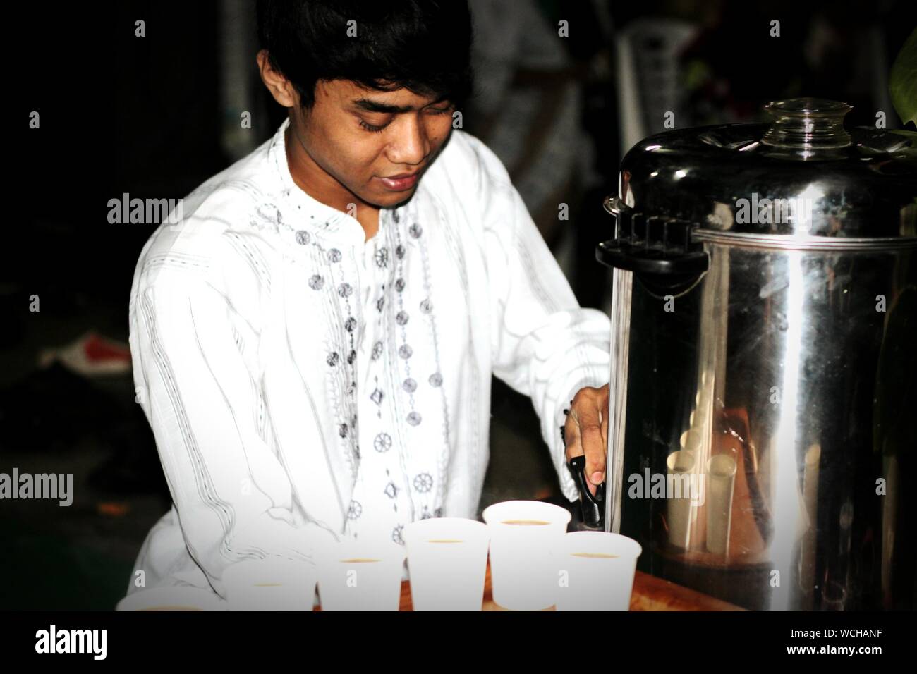 Man serving cafe hi-res stock photography and images - Alamy