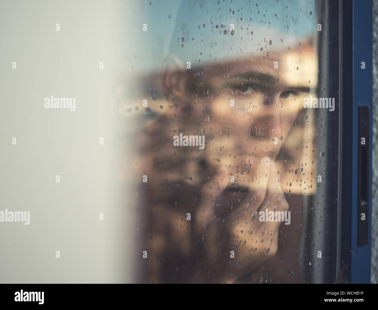 Man Seen Through Window High Resolution Stock Photography and Images ...