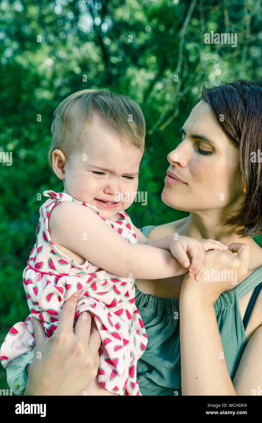 Family Standing Crying Stock Photos & Family Standing Crying Stock ...