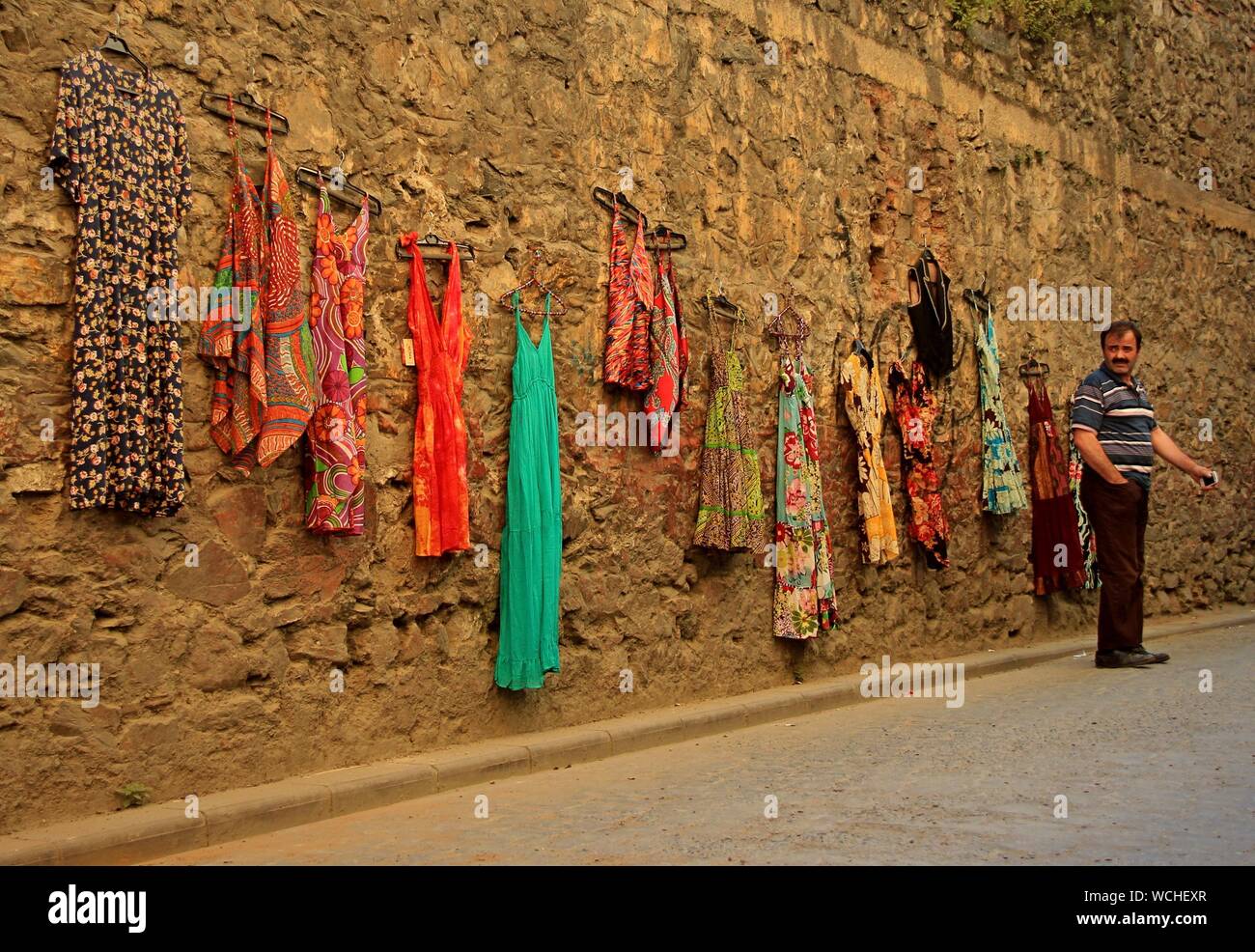 Man Hanging Clothes High Resolution Stock Photography and Images - Alamy