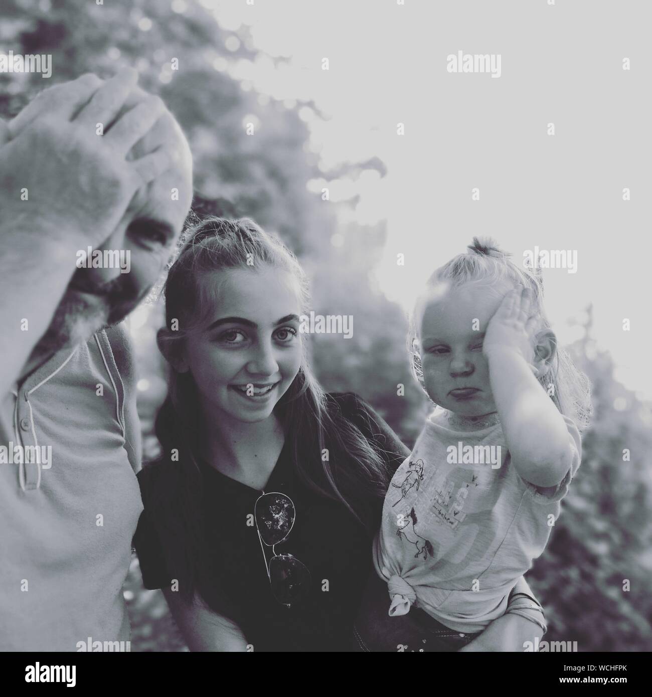 Father girls daughters family looking hi-res stock photography and ...