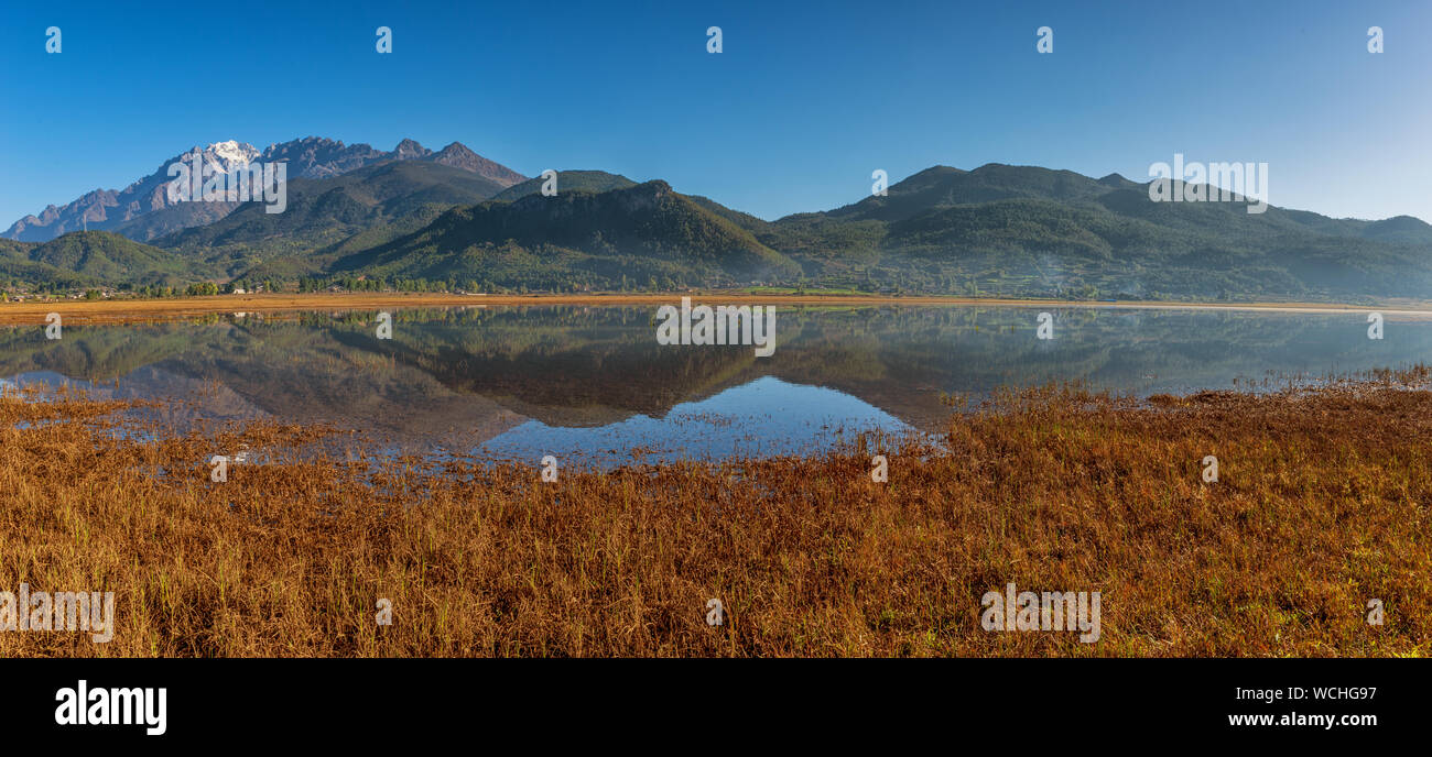 panorama cinematic view of mountain and lake with reflection Stock ...