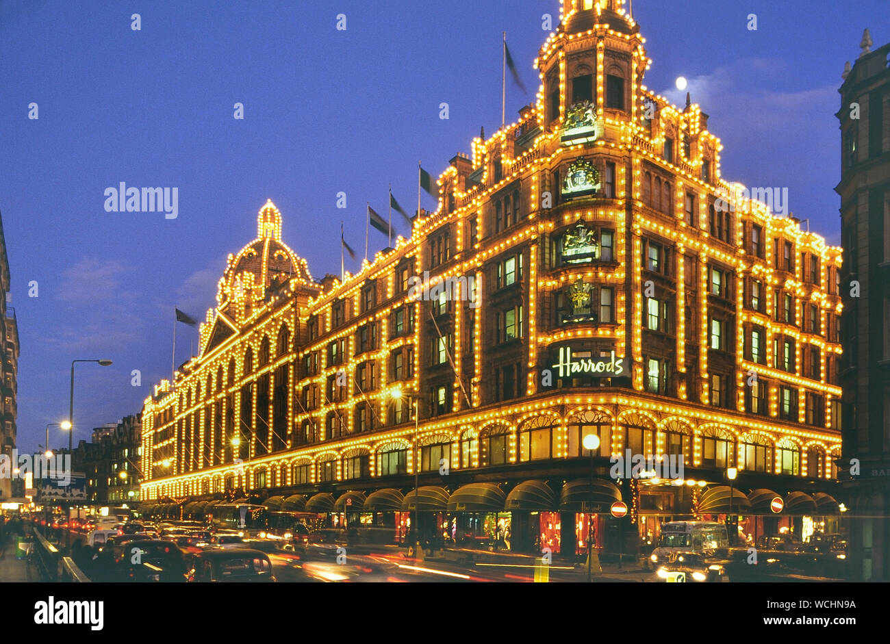 Night time at Harrods, Knightsbridge, London, England, UK. Circa 1980's ...