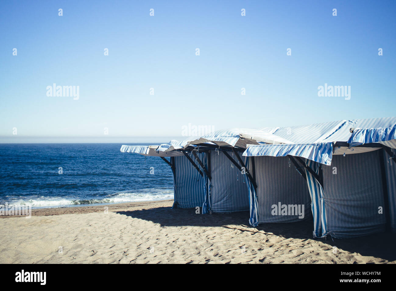 Blue beach huts blue beach hut hi-res stock photography and images - Alamy