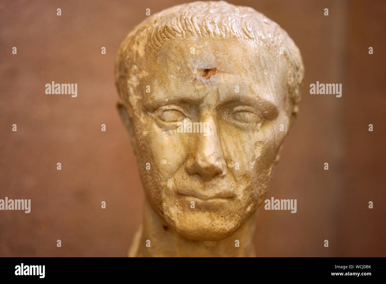 Ancient Greek and Roman statues on display in the museum in Corinth ...