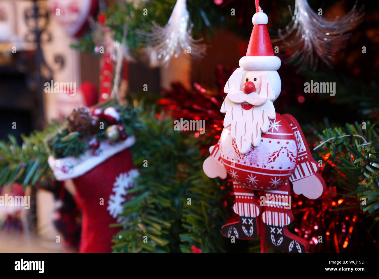 Santa claus with christmas tree hi-res stock photography and images - Alamy