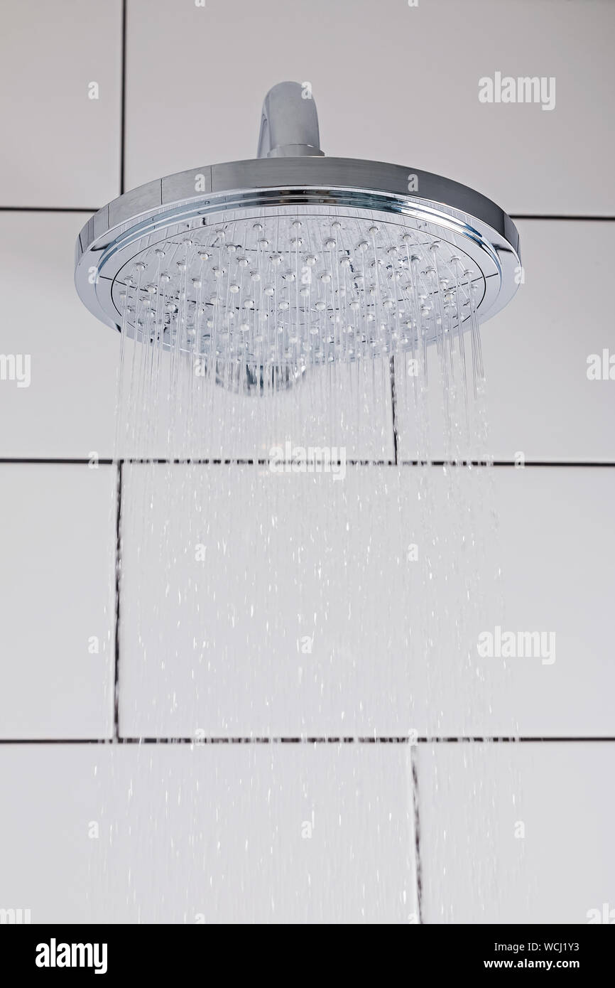 Modern shower with flowing water close-up Stock Photo - Alamy