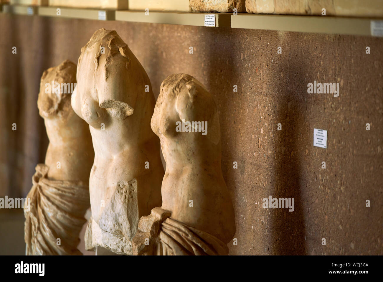 Ancient Greek and Roman statues on display in the museum in Corinth ...