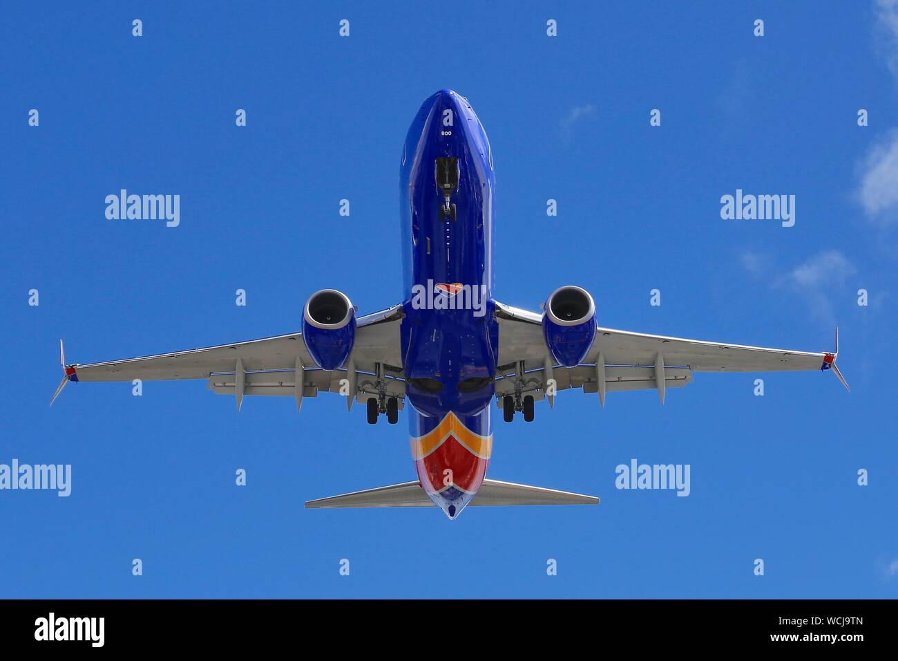 An aircraft on final approach into an airport Stock Photo - Alamy