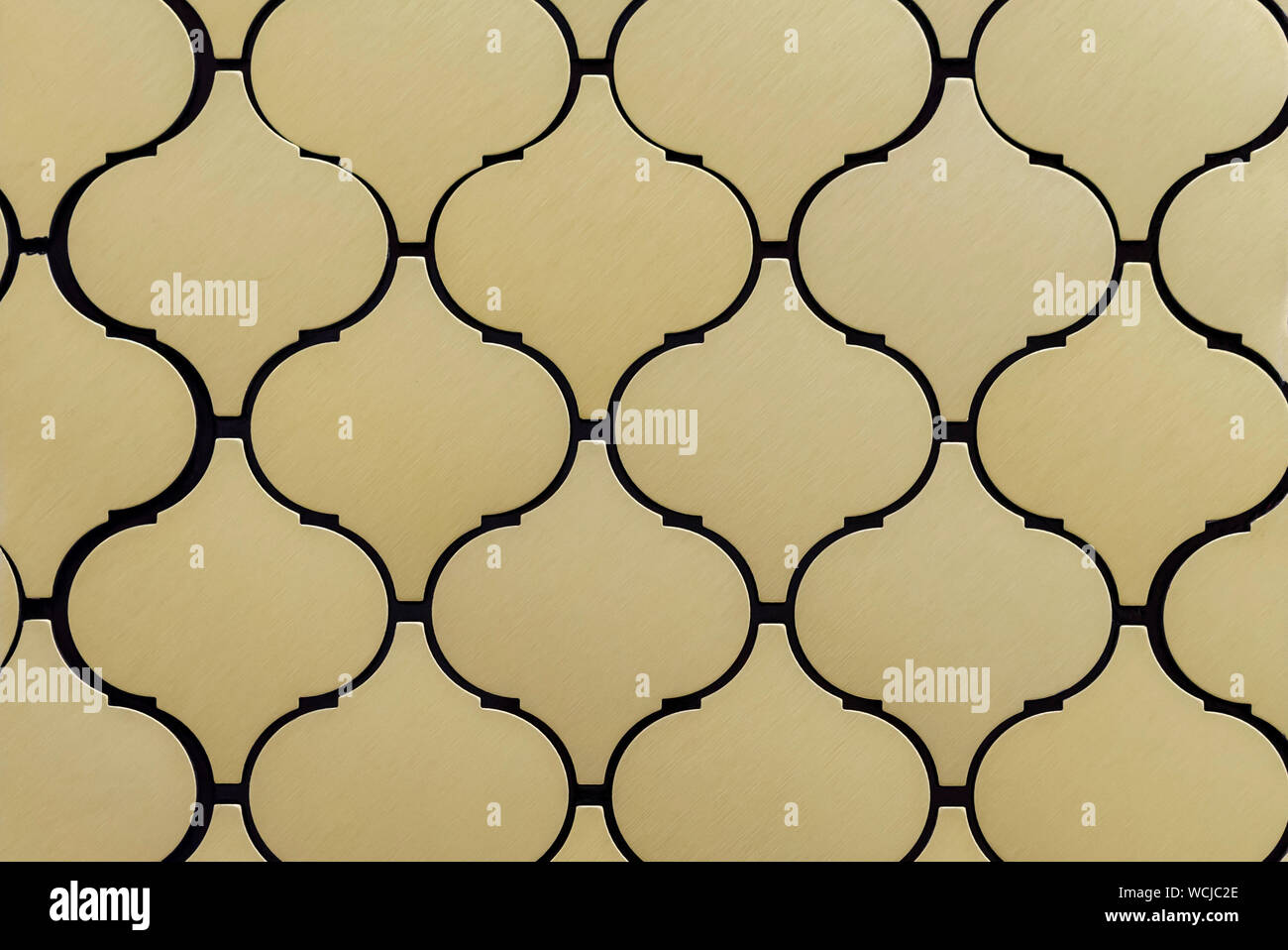 Metal mosaic tiles with patterns in a modern interior Stock Photo - Alamy