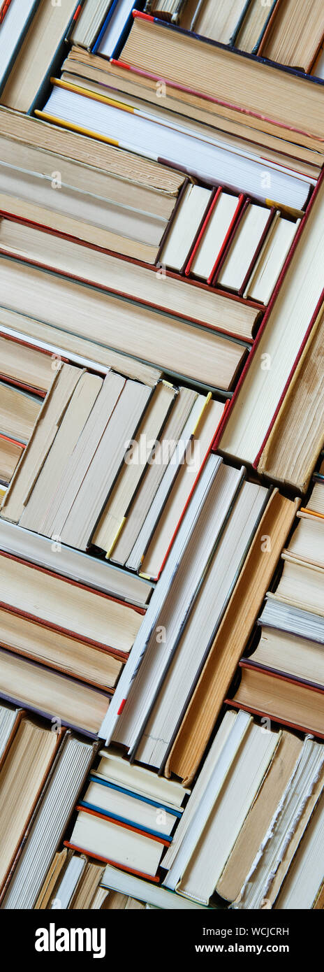 Books stack texture and background Stock Photo - Alamy