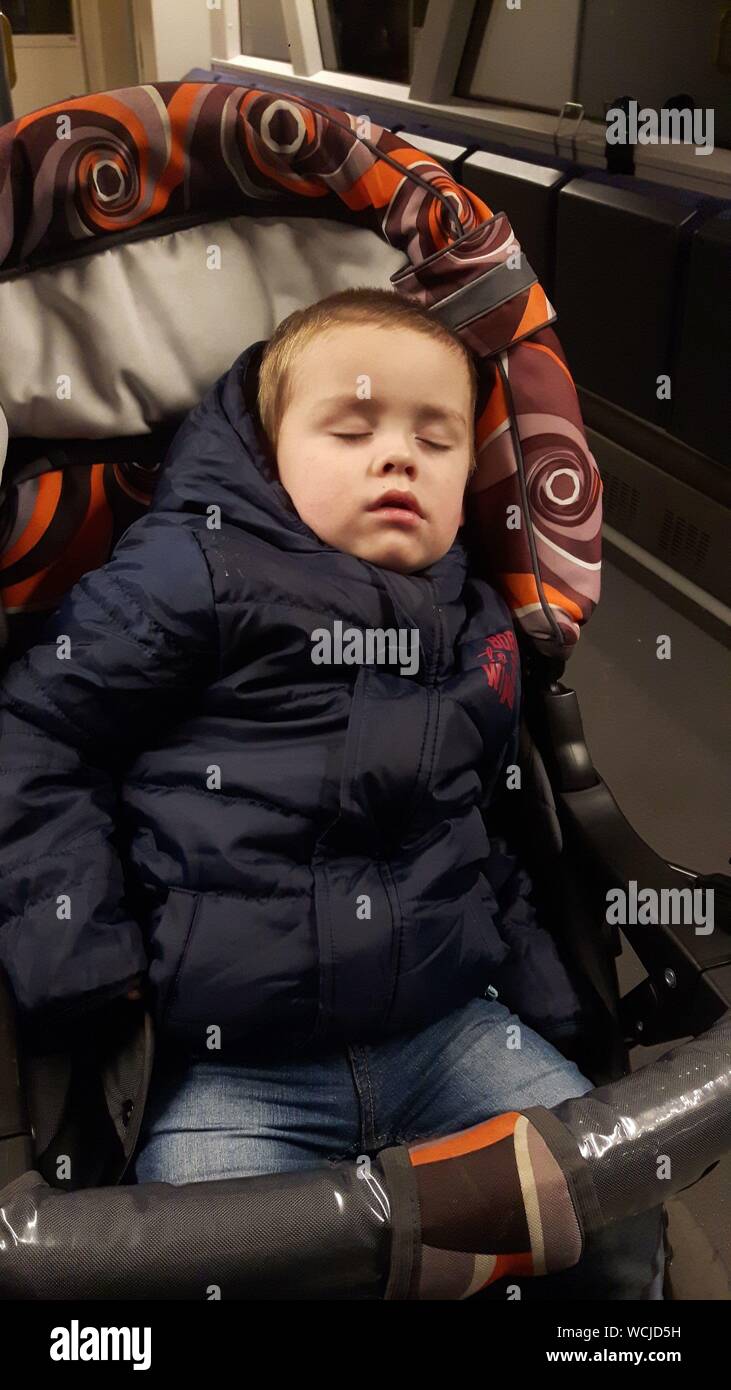 Baby Sleeping In Stroller High Resolution Stock Photography and Images ...