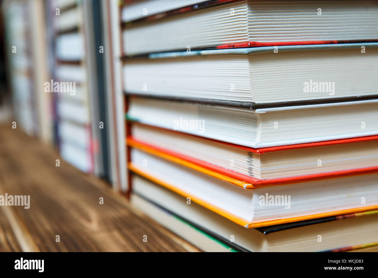 Books stack texture and background Stock Photo - Alamy