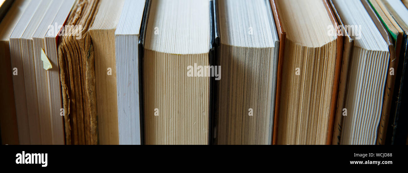 Books stack texture and background Stock Photo - Alamy
