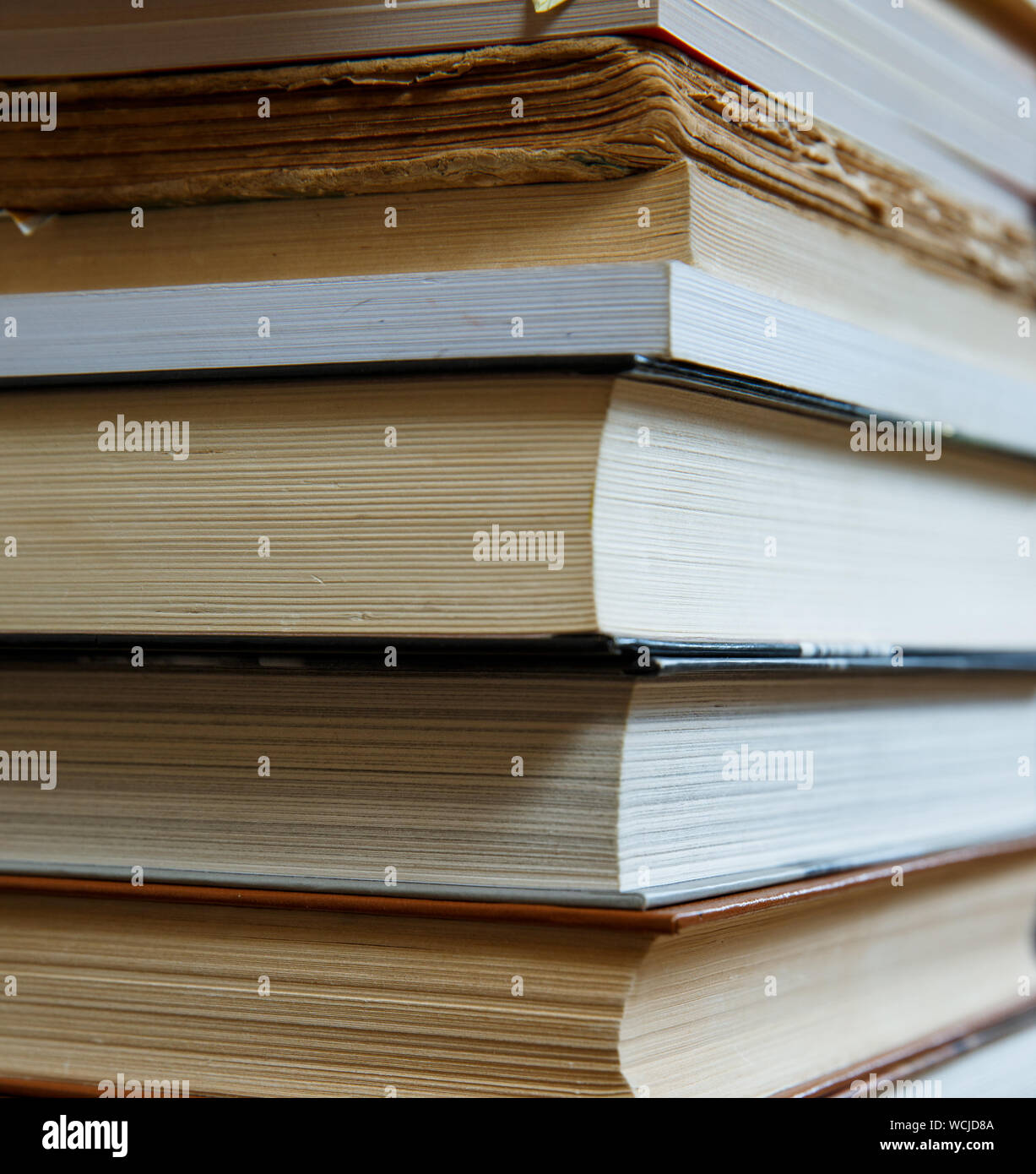 Books stack texture and background Stock Photo - Alamy