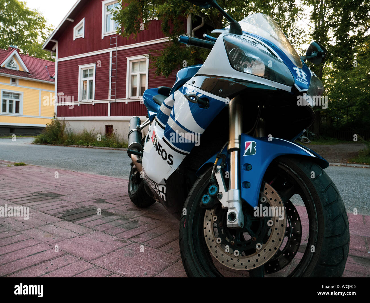 Blue and white motorcycle Stock Photo - Alamy
