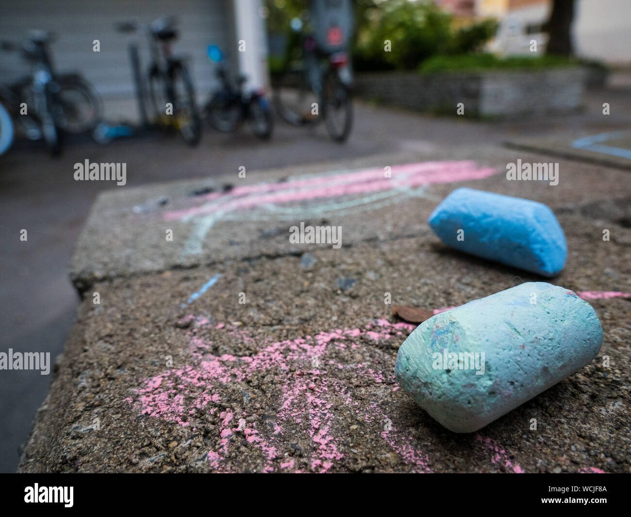 Colorful chalk outside Stock Photo - Alamy