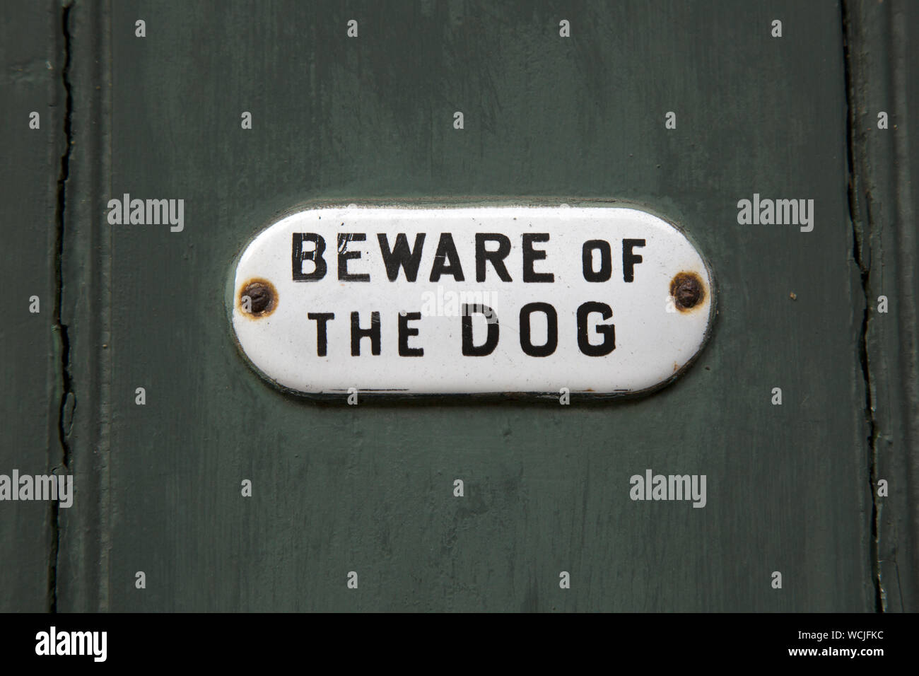 Beware of the Dog Warning Sign Stock Photo - Alamy
