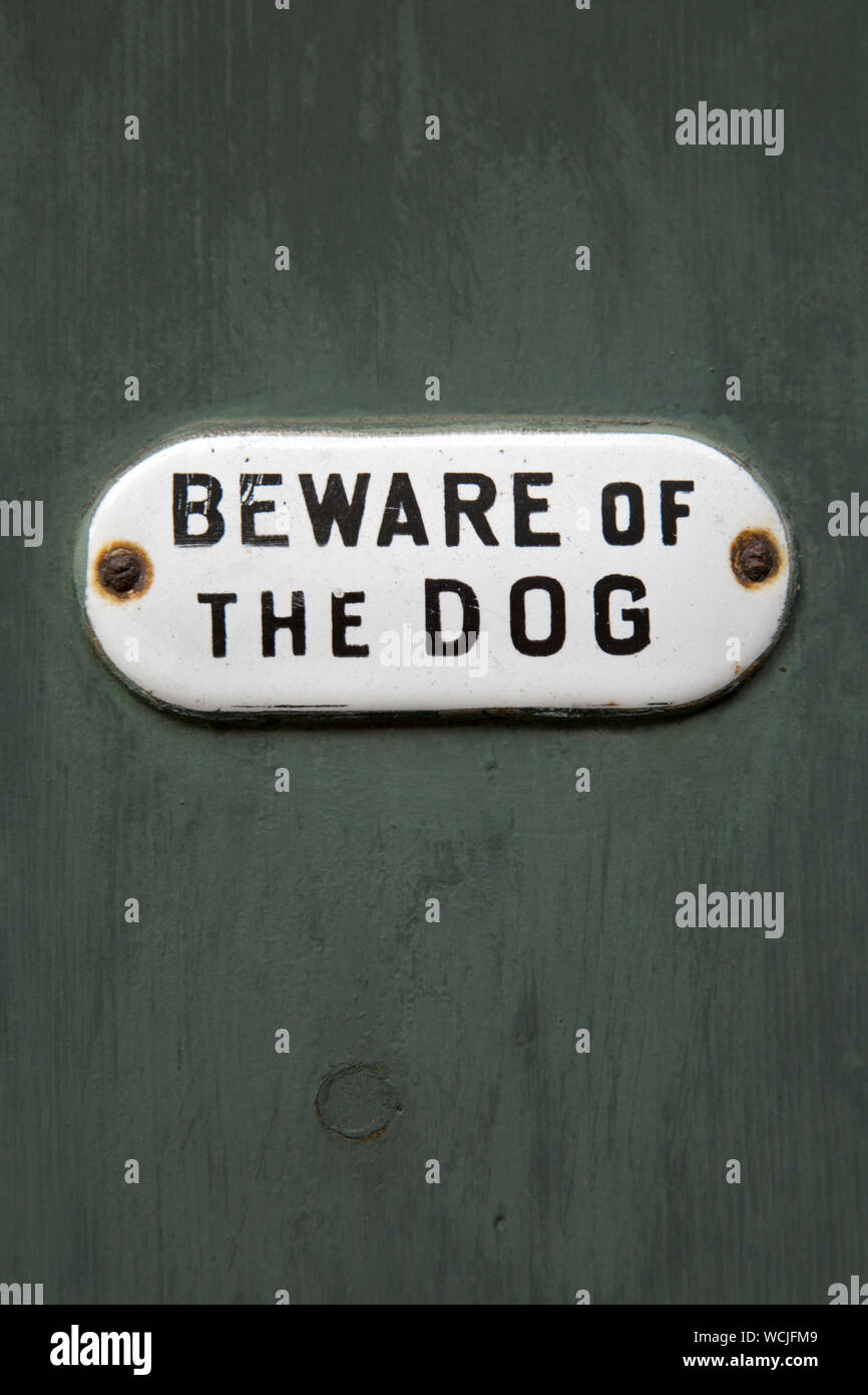 Beware of the Dog Warning Sign Stock Photo - Alamy