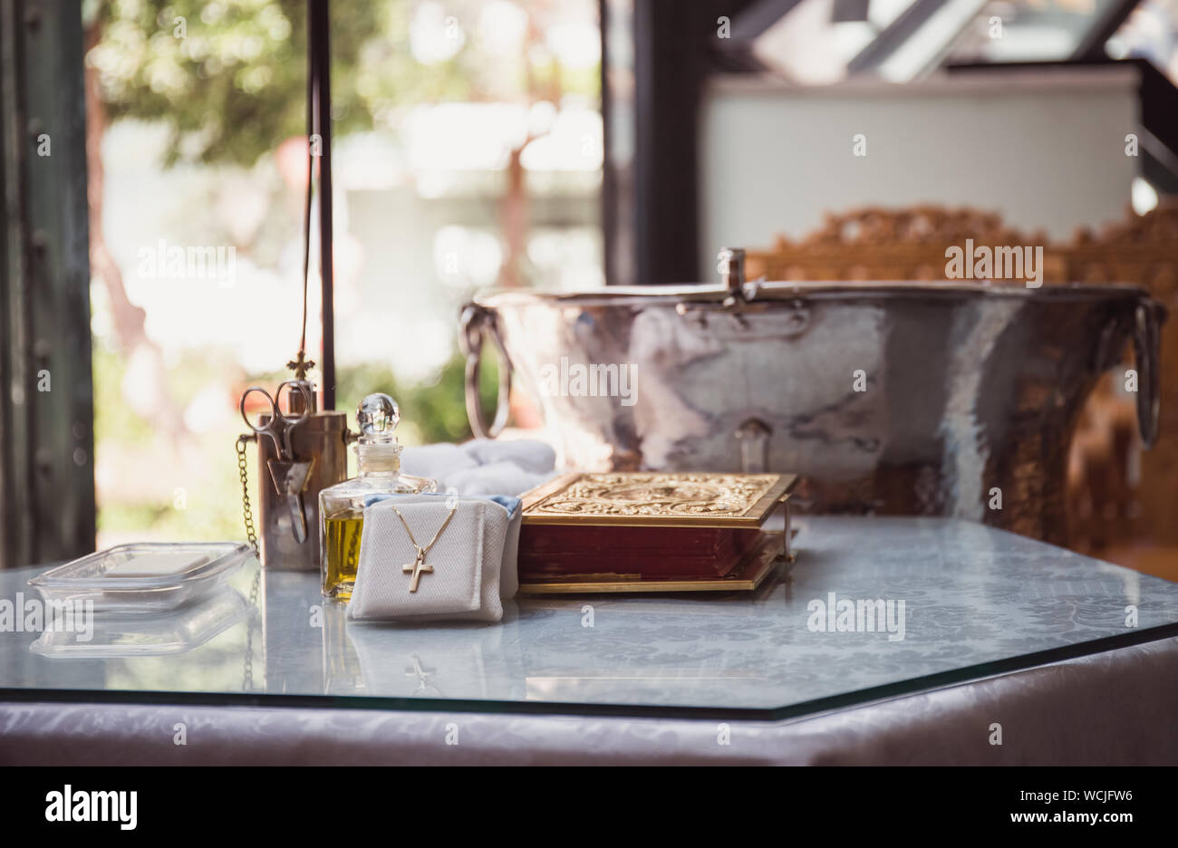 Accessories of a priest for Christian baptism Stock Photo - Alamy