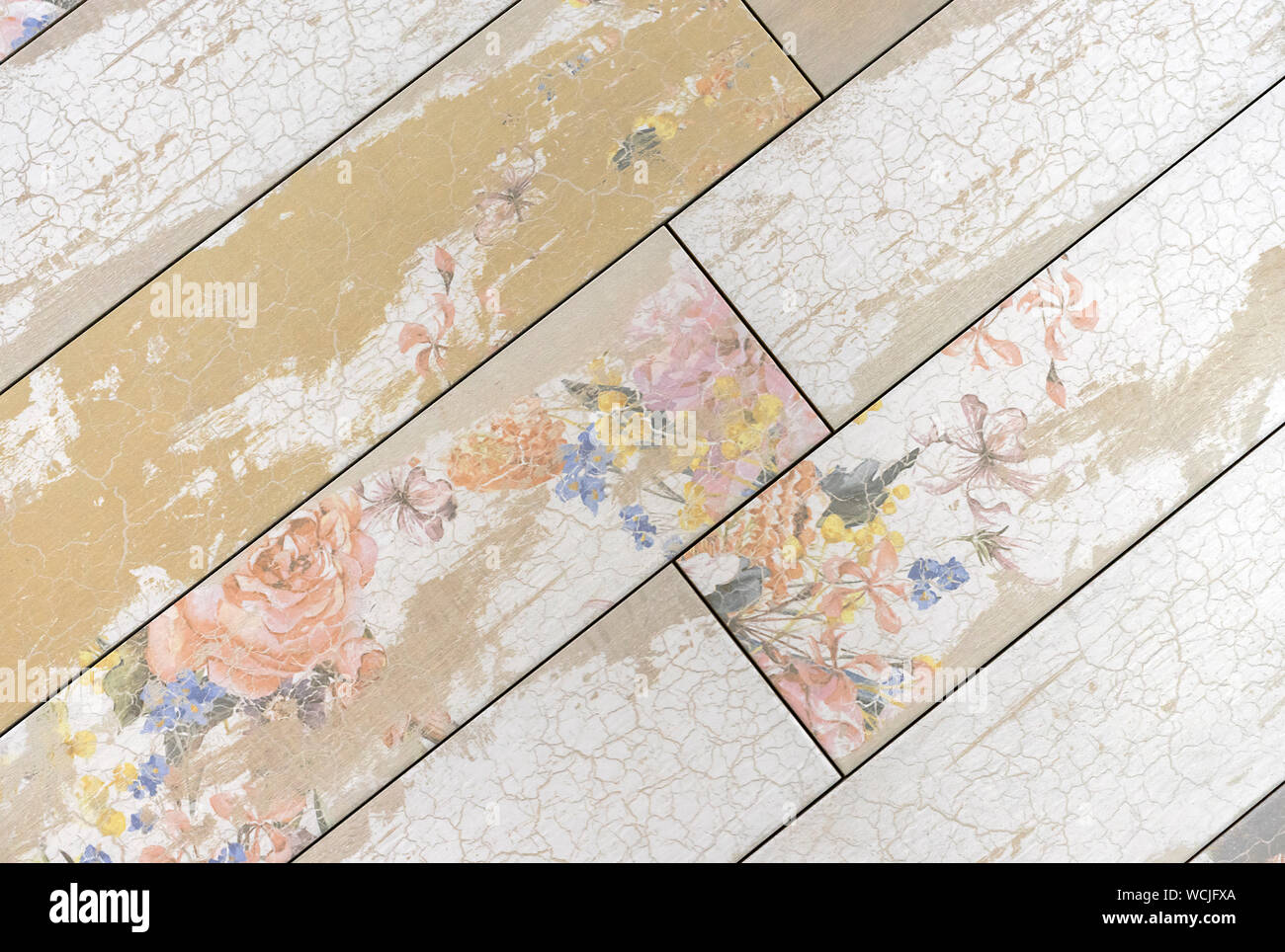 Beige ceramic tiles with floral patterns. Background from beige tiles ...