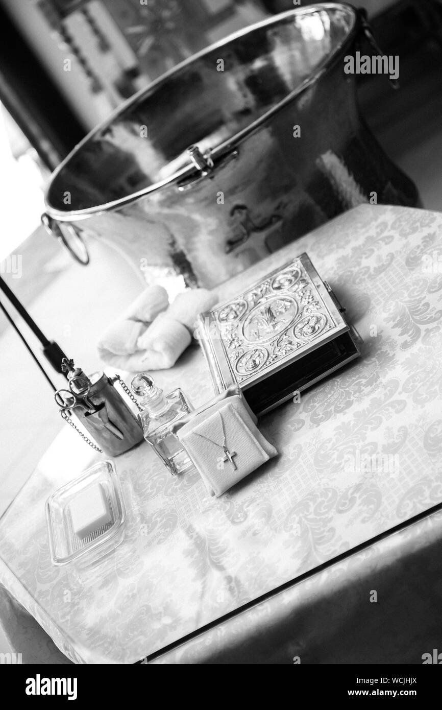Accessories of a priest for Christian baptism Stock Photo - Alamy