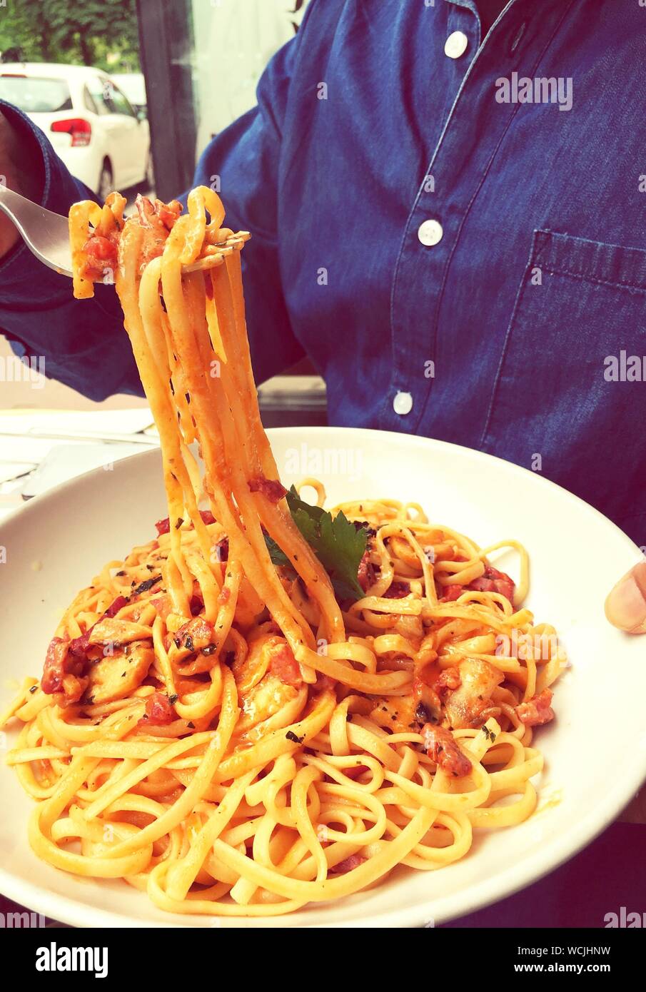Close up man eating pasta hi-res stock photography and images - Alamy