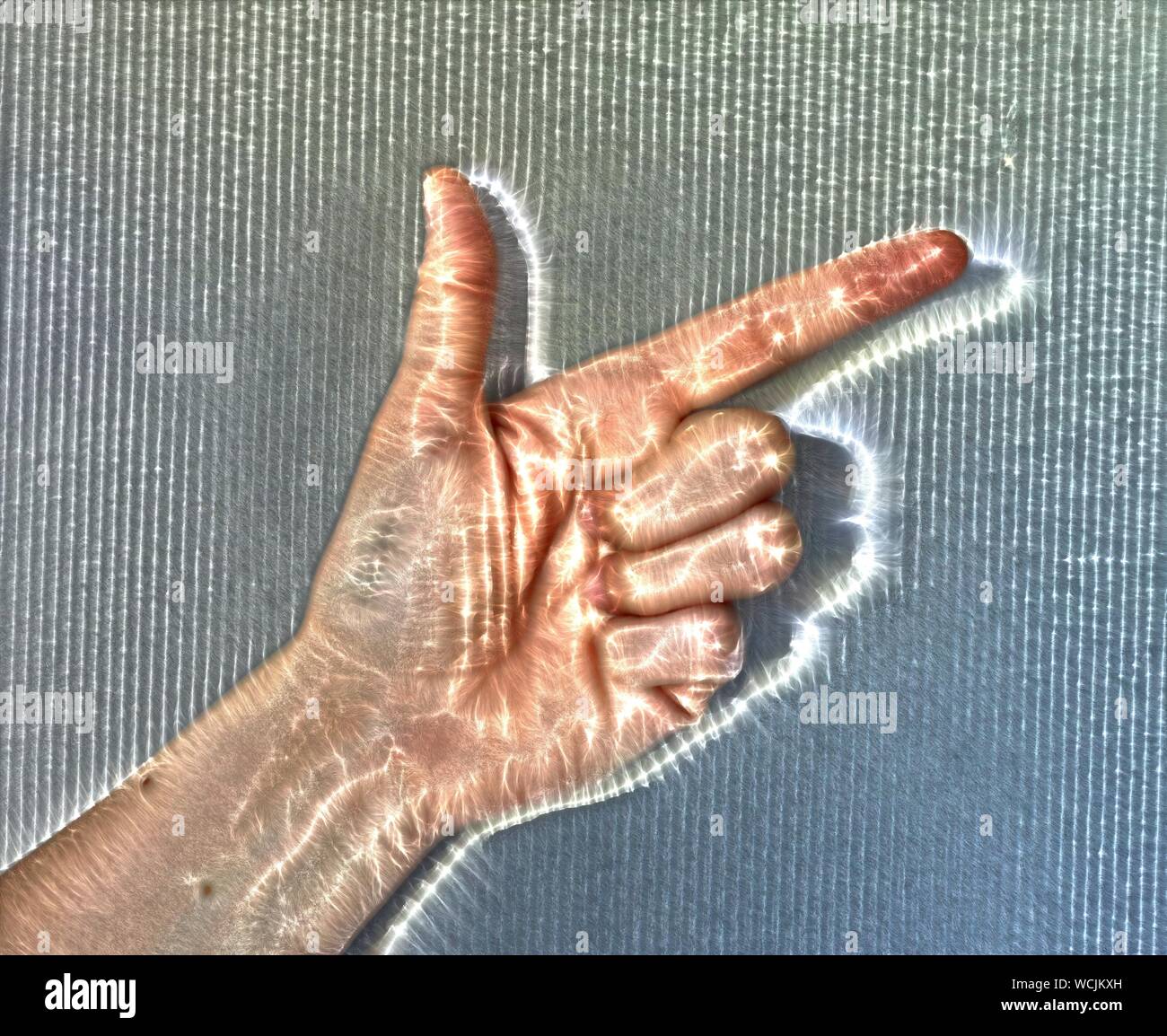 Foto of a glowing human female hand with a kirlian aura showing ...