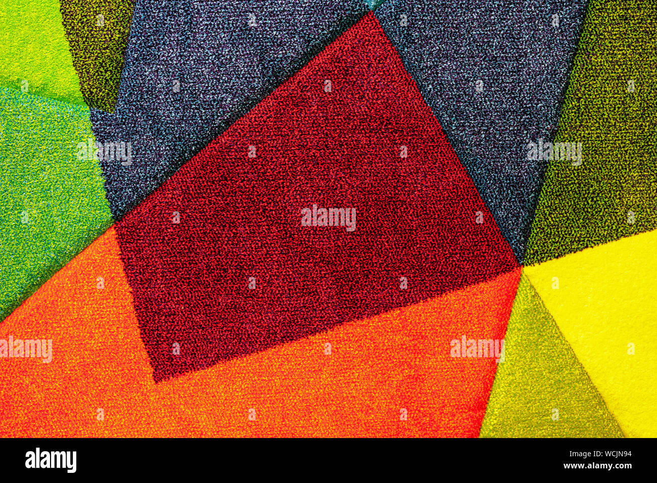 Texture of a multi-colored carpet. Background of the carpet with multi ...