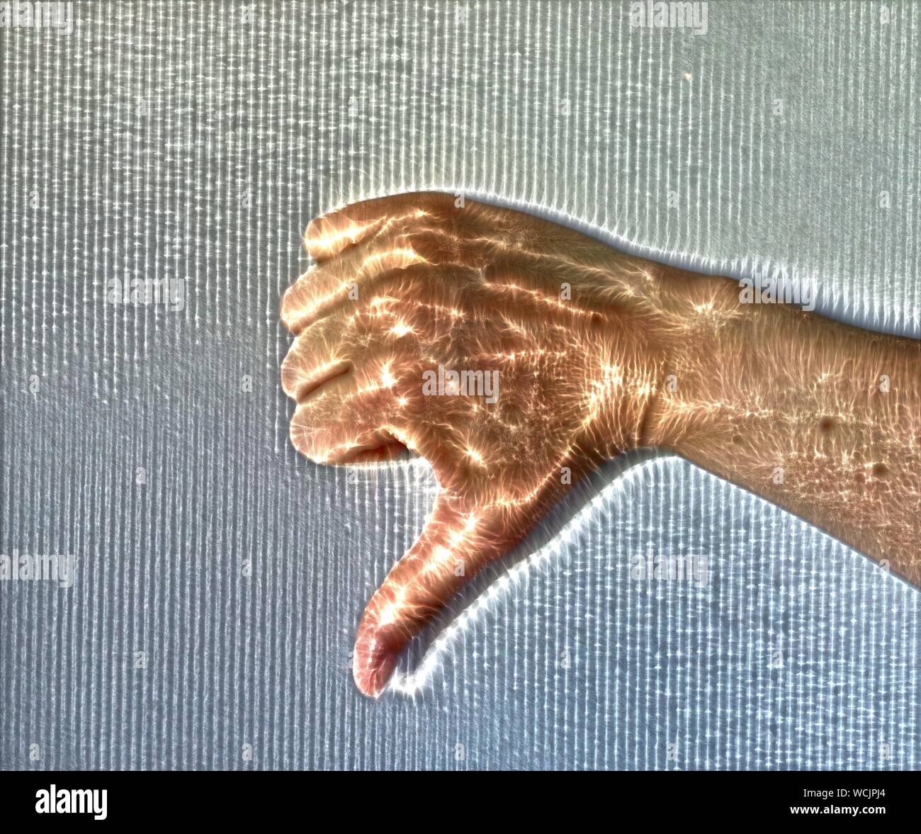 Foto of a glowing human female hand with a kirlian aura showing ...