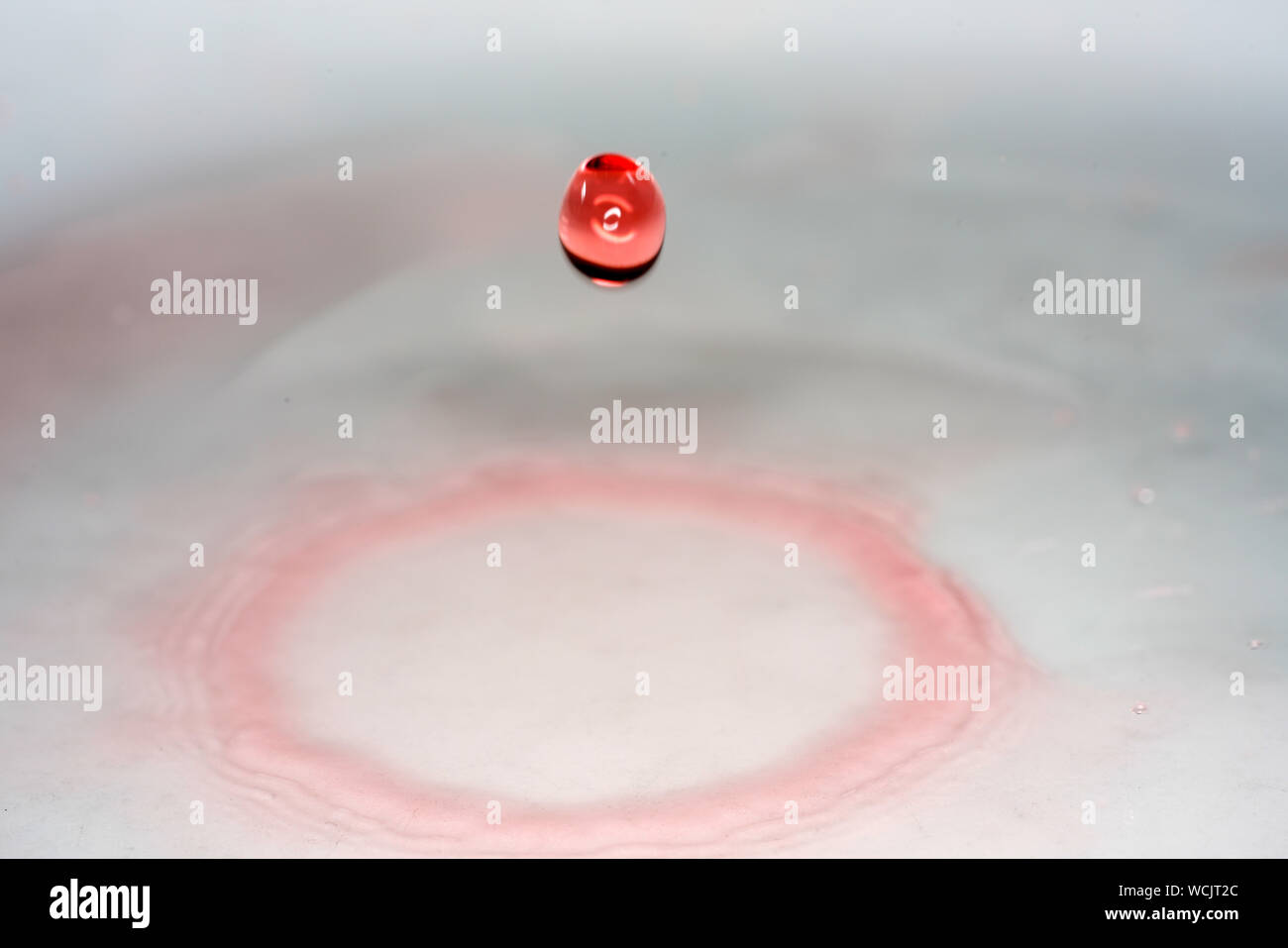 Water drops photographed with higspeed flashes and dropper in the ...