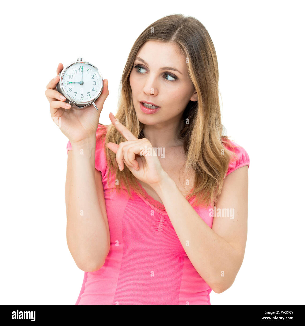 Woman pointing to clock hi-res stock photography and images - Alamy