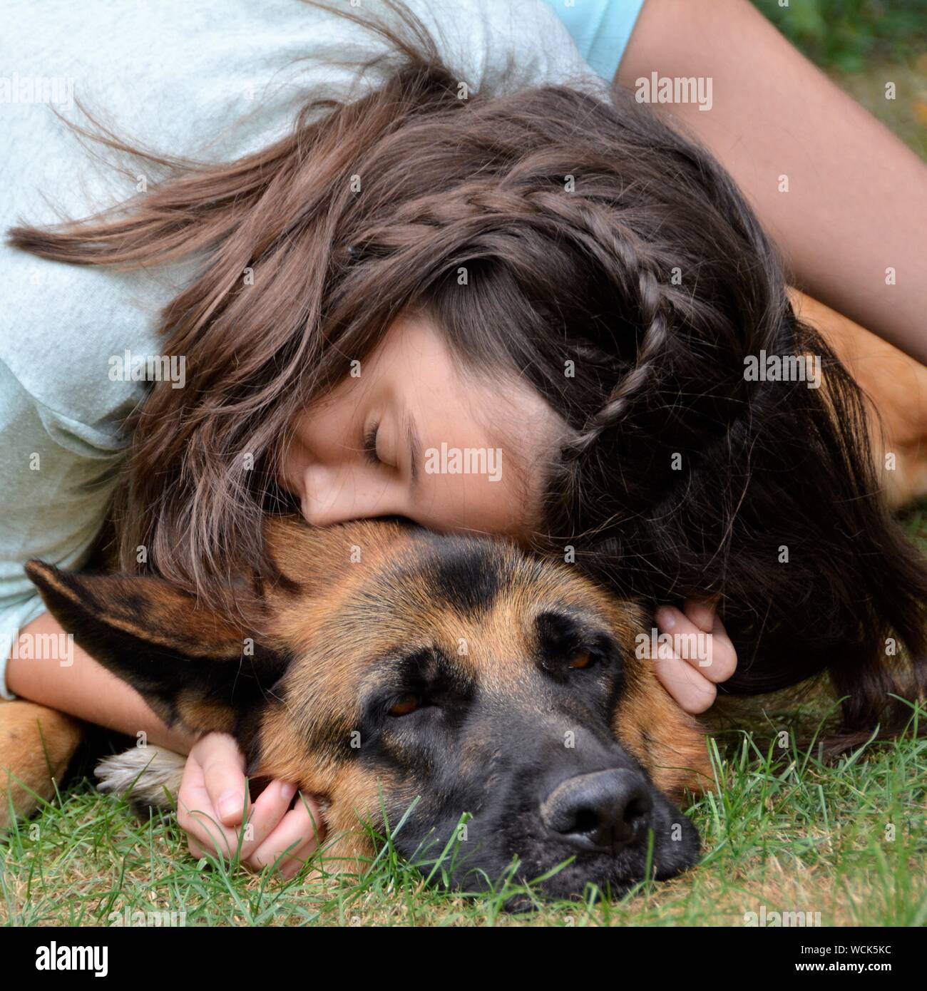 Girl embracing her dog hi-res stock photography and images - Alamy