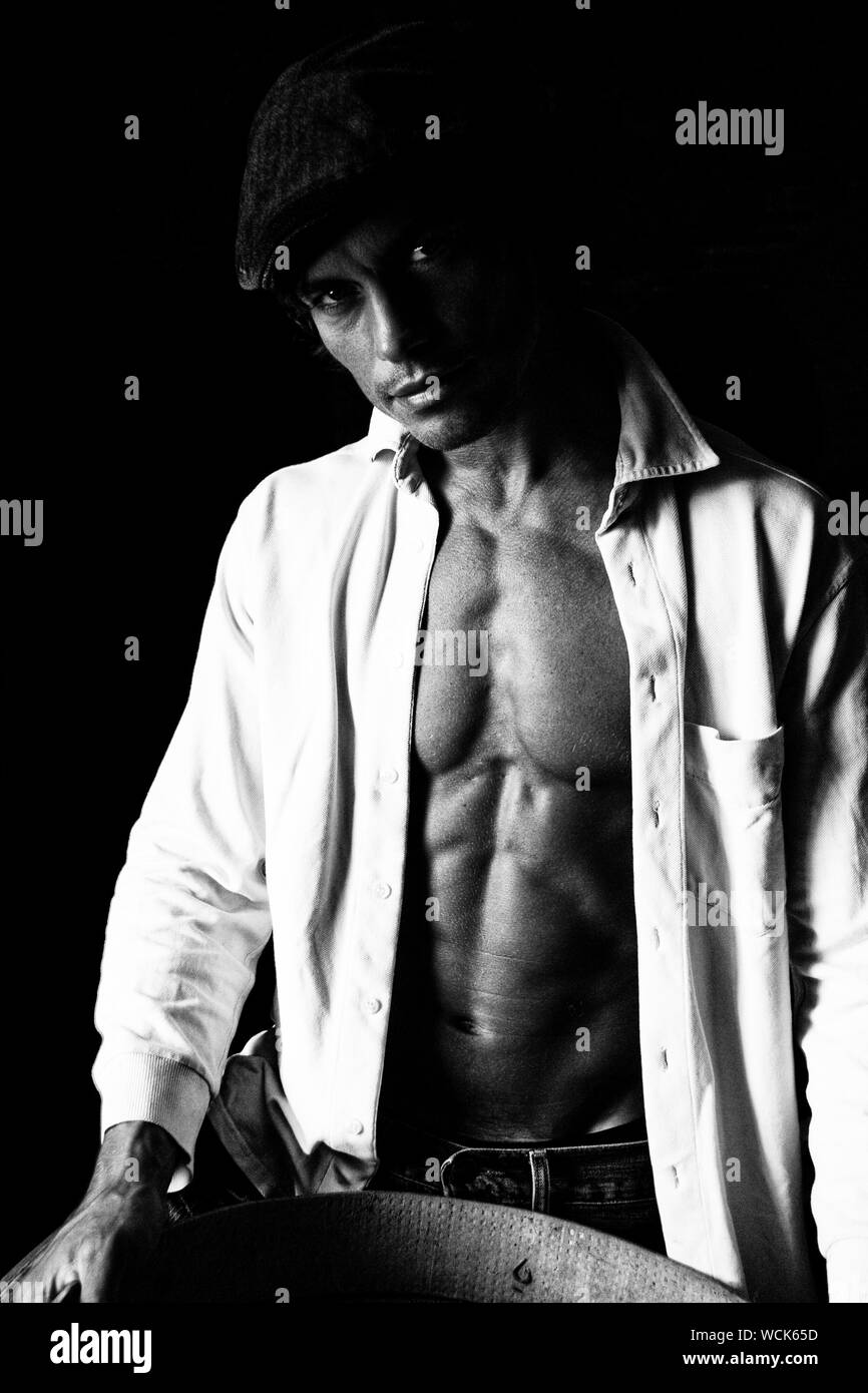 Shirt unbuttoned hi-res stock photography and images - Alamy