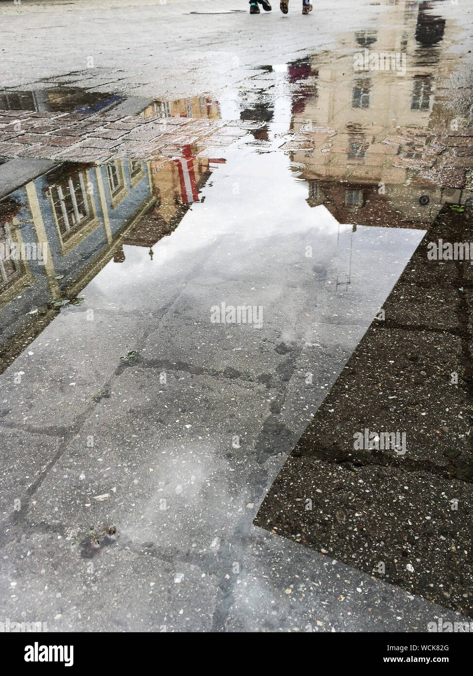 Rain puddle city hi-res stock photography and images - Alamy