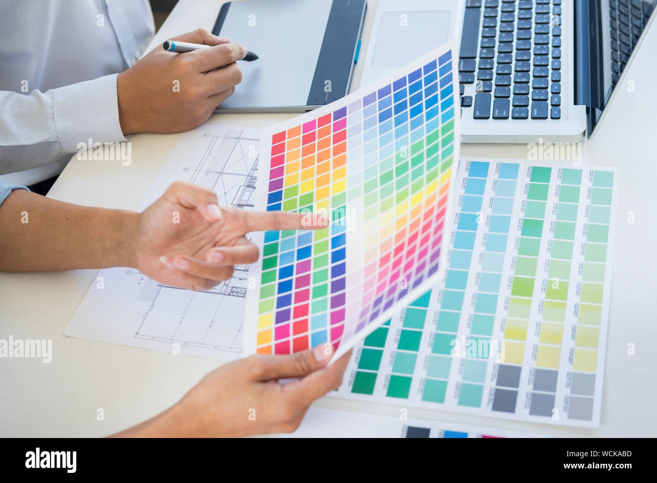 Desk with computer and color swatches hi-res stock photography and ...