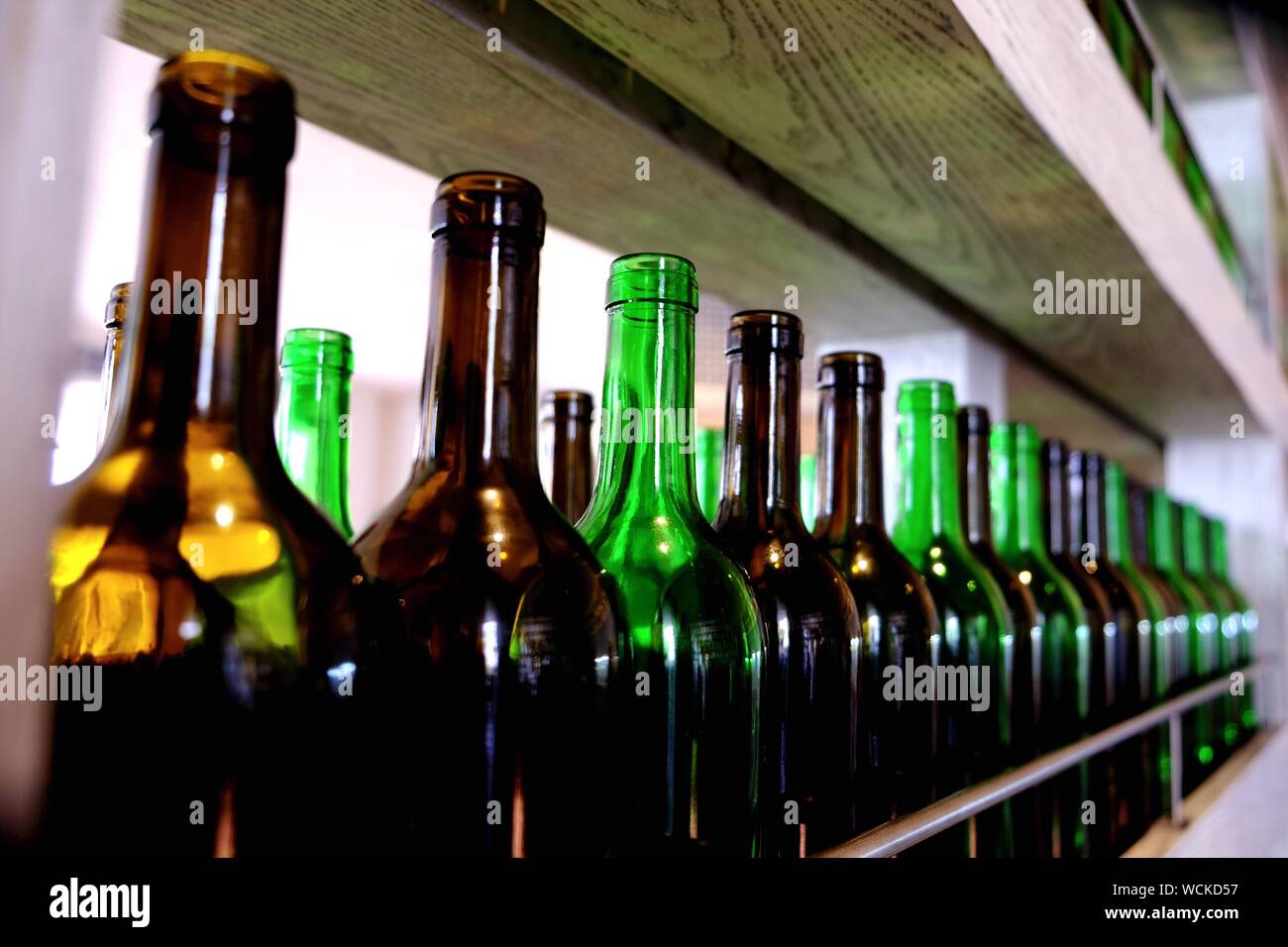 Row wine bottles hi-res stock photography and images - Alamy