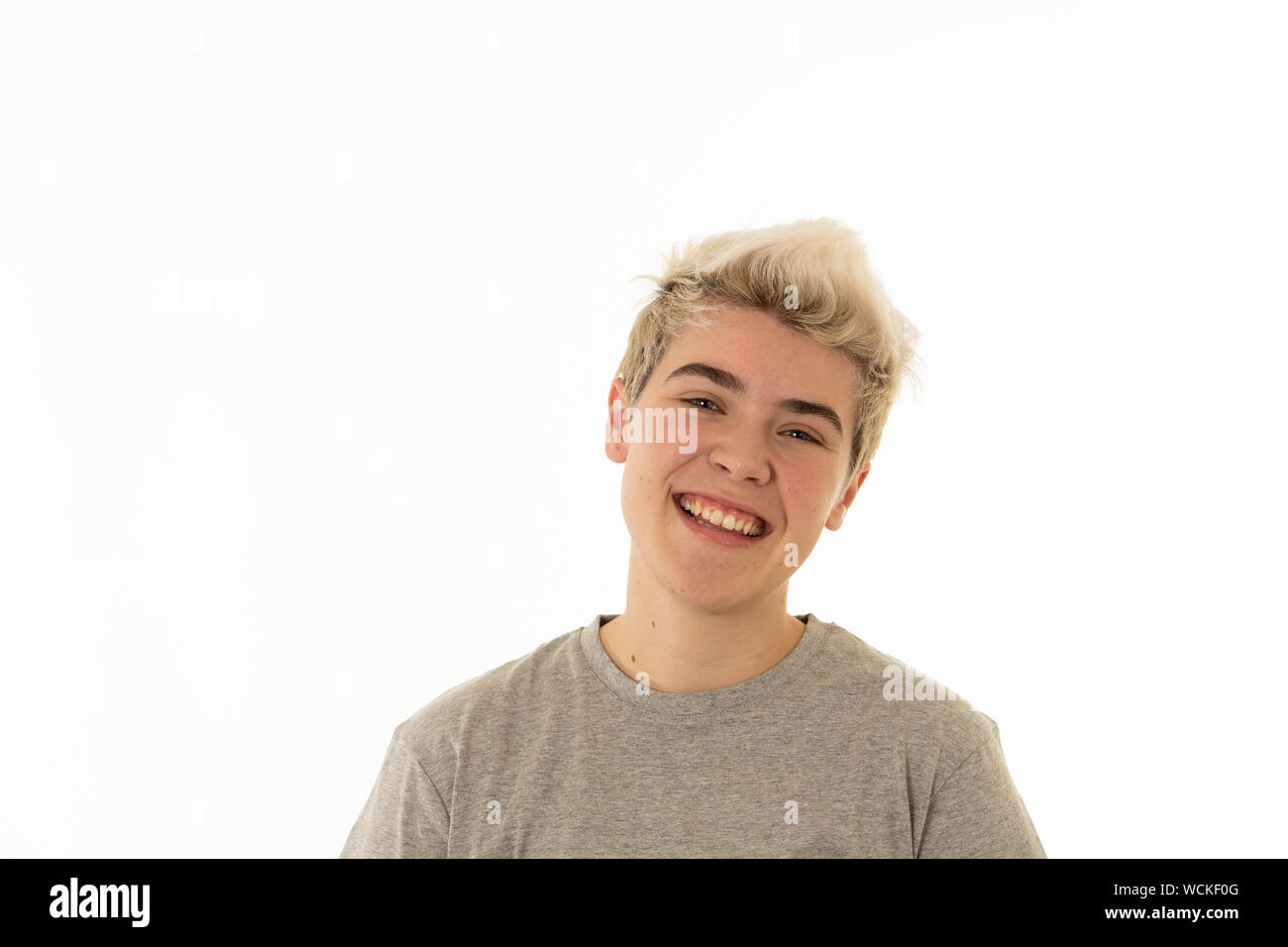 Portrait of handsome young transgender teenager man with beautiful ...