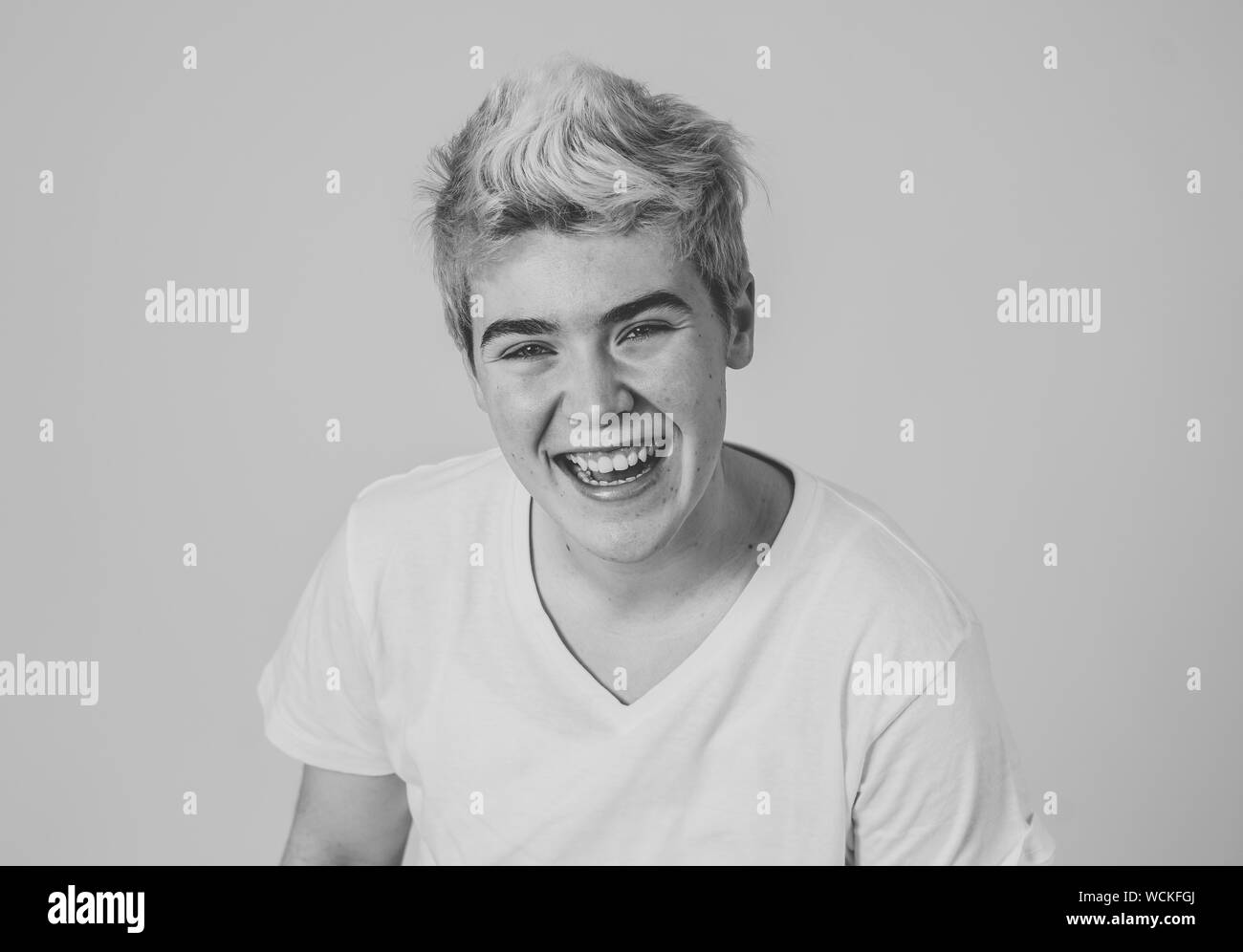 Portrait of handsome young transgender teenager man with beautiful ...