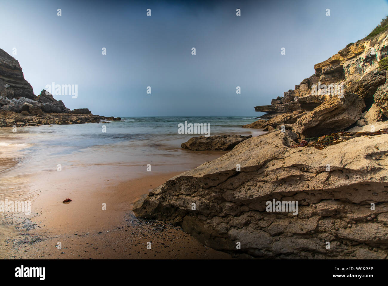 Ocean waves breaking in a beach Stock Photo - Alamy
