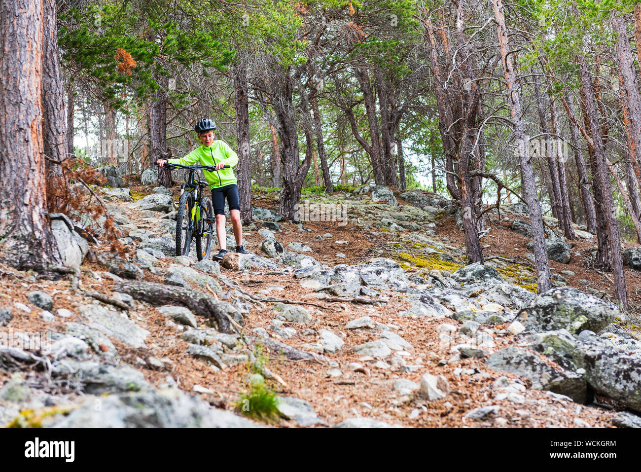 Boy riding Mountain Bike in Norway Stock Photo - Alamy