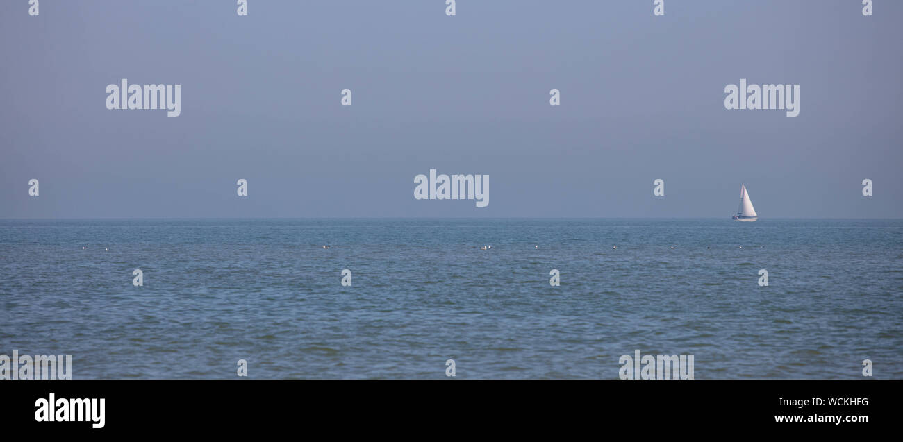 The Boat in the distance Stock Photo - Alamy
