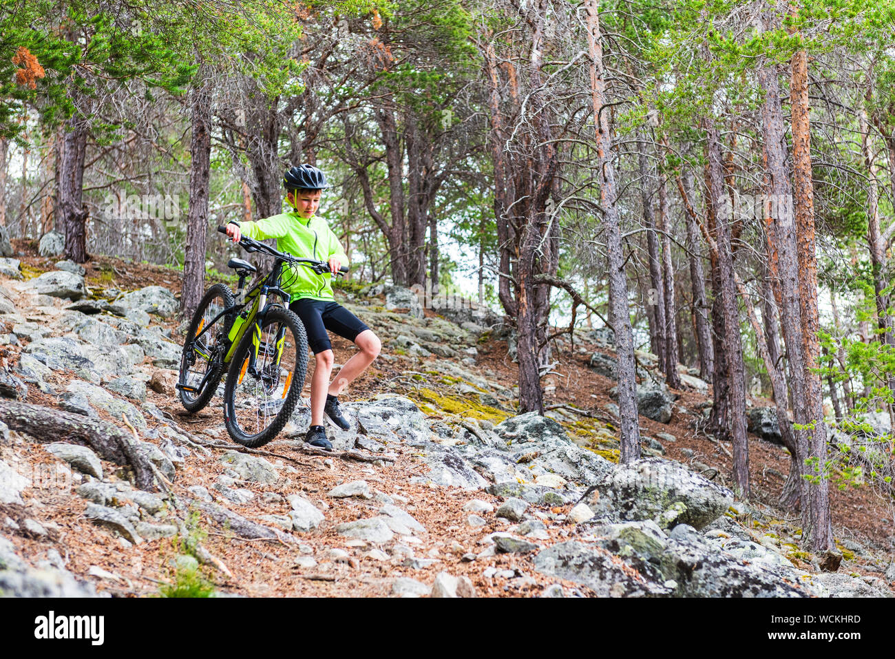 Boy riding Mountain Bike in Norway Stock Photo - Alamy