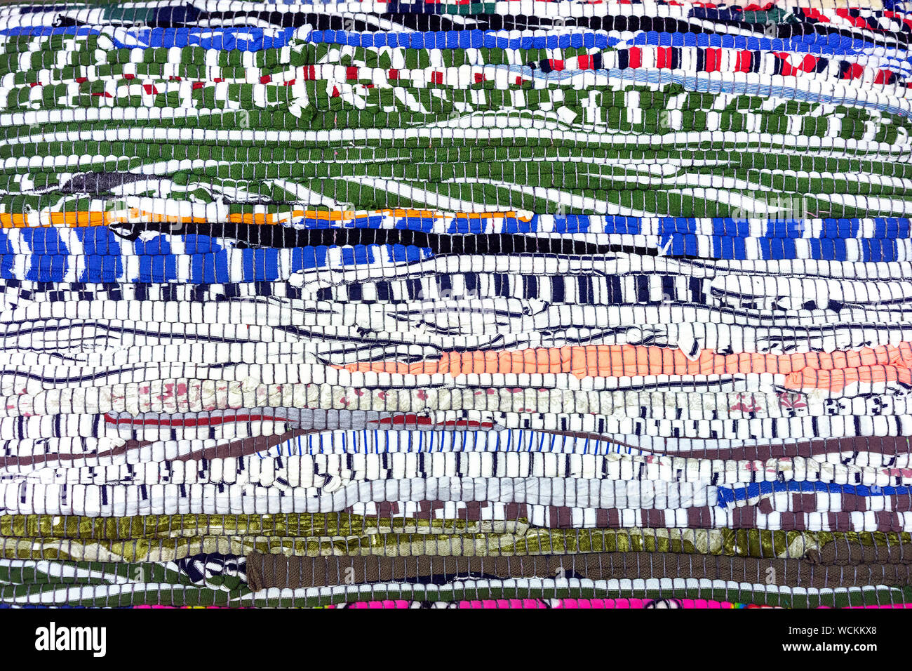 Rug of pieces of cloth. Texture and background of patchwork carpet ...